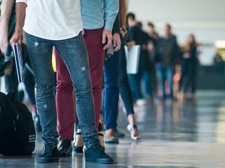 Do you wait 'on line' or 'in line'? | Merriam-Webster