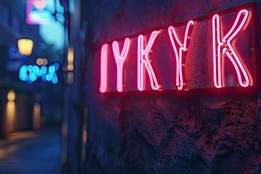 iykyk if you know you know slang written in a neon